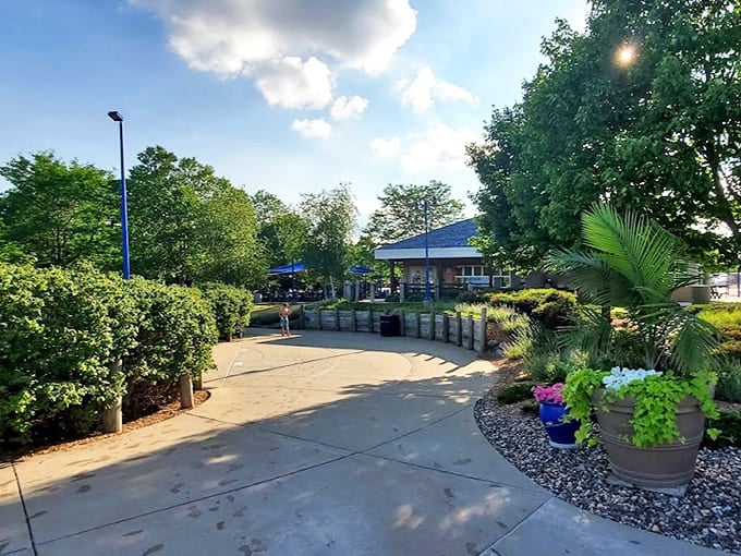 Thoughtful landscaping transforms what could be concrete jungle into an oasis &ndash; proof that plants and pools can coexist beautifully.