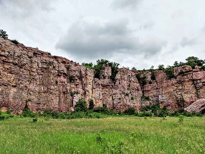 Standing beneath this towering cliff face makes you feel delightfully insignificant &ndash; like being a chocolate chip in the cosmic cookie of existence.
