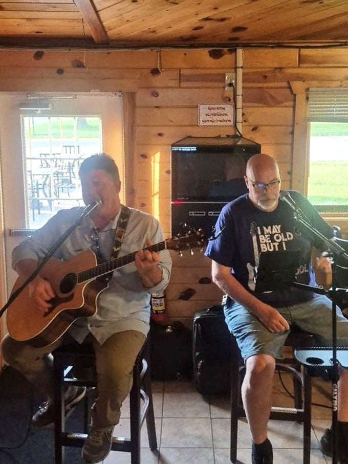 Musicians set up in the corner, turning an ordinary evening into an intimate concert experience for lucky patrons.
