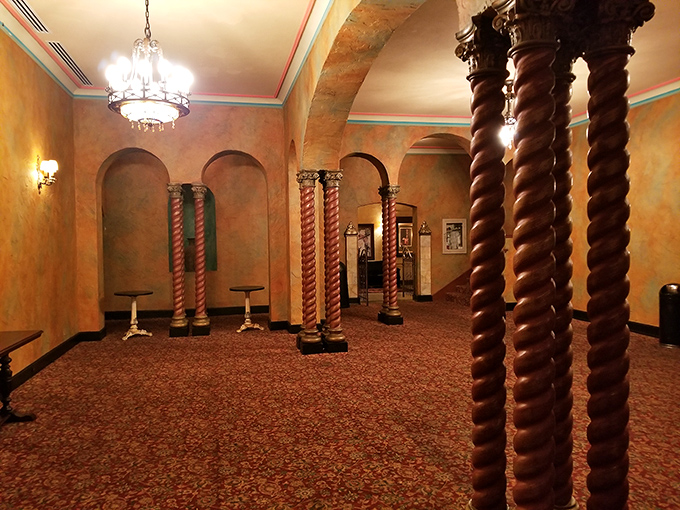 Twisted columns and arched doorways transform the lobby into a European courtyard, making even a simple trip to the restroom feel like a stroll through Barcelona.
