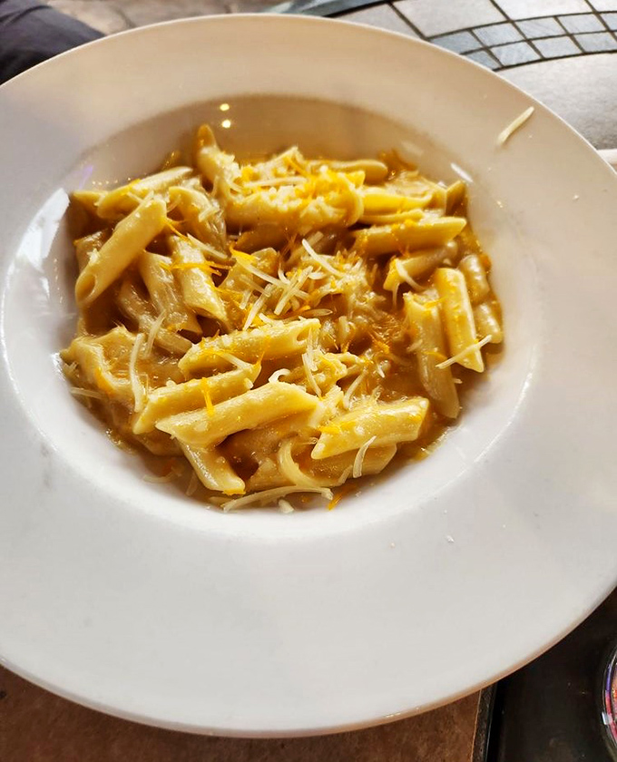 This mac and cheese isn't just comfort food &ndash; it's a warm hug in a bowl that somehow makes everything right with the world.