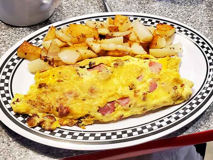 This ham and cheese omelet isn't trying to reinvent breakfast &ndash; it's just executing the classics with fluffy, golden precision.