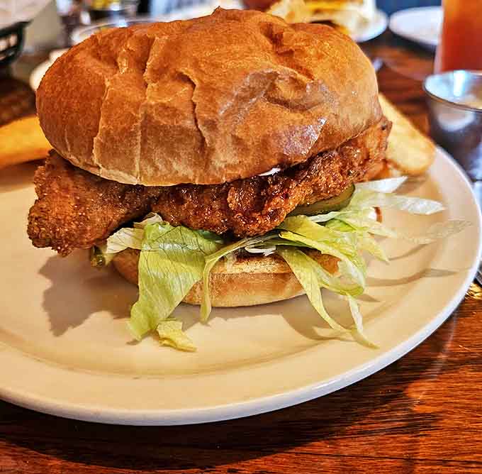 The Nashville Hot Chicken Sandwich brings Southern heat to Michigan &ndash; crispy, fiery goodness cushioned by a pillowy bun and cooling lettuce.