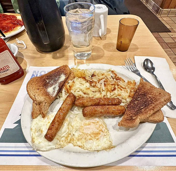 A classic North Pole breakfast spread that would make Paul Bunyan himself nod with approval &ndash; eggs, sausage, and toast in perfect harmony.