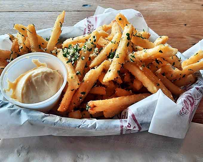Golden, herb-flecked potato perfection that elevates the humble french fry to VIP status on your plate.