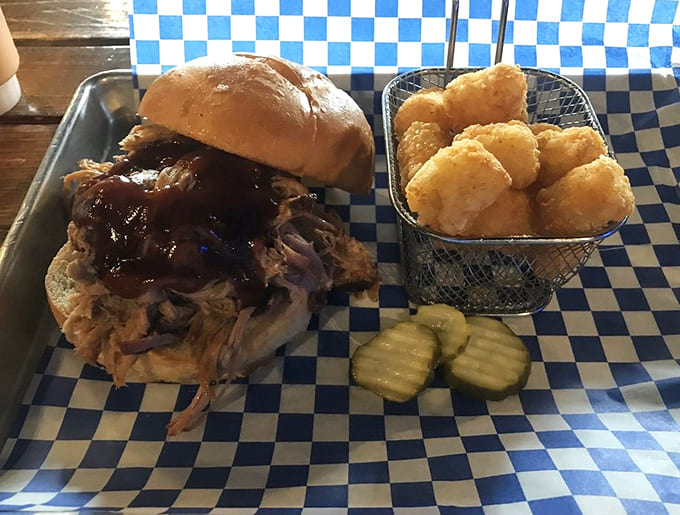 Pulled pork sandwich with tater tots: Golden-brown tots with the perfect crunch factor join forces with the pulled pork sandwich for a match made in comfort food heaven.