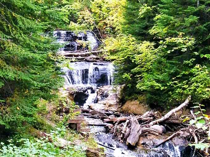 Sable Falls cascades down nature's staircase, creating a symphony of sound that drowns out everything except your "wows" and camera clicks.