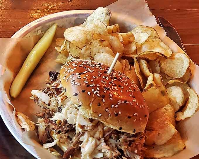 This sandwich doesn't just satisfy hunger &ndash; it conquers it with tender pulled pork, crispy bacon, and a bun that somehow contains all that glory.