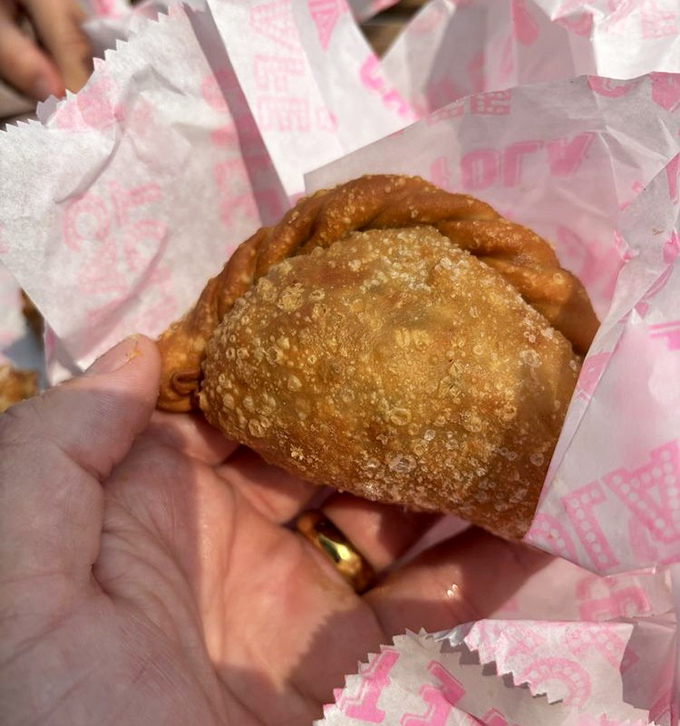 The steak empanada's perfectly crimped edge is like nature's handle for delivering savory, beefy goodness straight to your mouth.