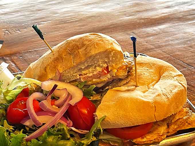 The Steak Lomito sandwich isn't just lunch&mdash;it's an event! Tender steak, fresh veggies, and a side salad create a meal that satisfies without overwhelming.