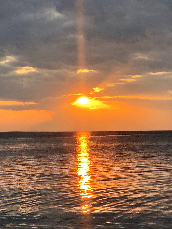 When the sun bids farewell at Father Hennepin, it doesn't just set, it performs a full technicolor spectacle.