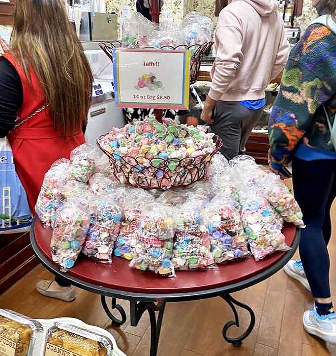 The colorful taffy display looks like an edible rainbow &ndash; each twisted package promising a jaw workout worth every minute of dental commitment.