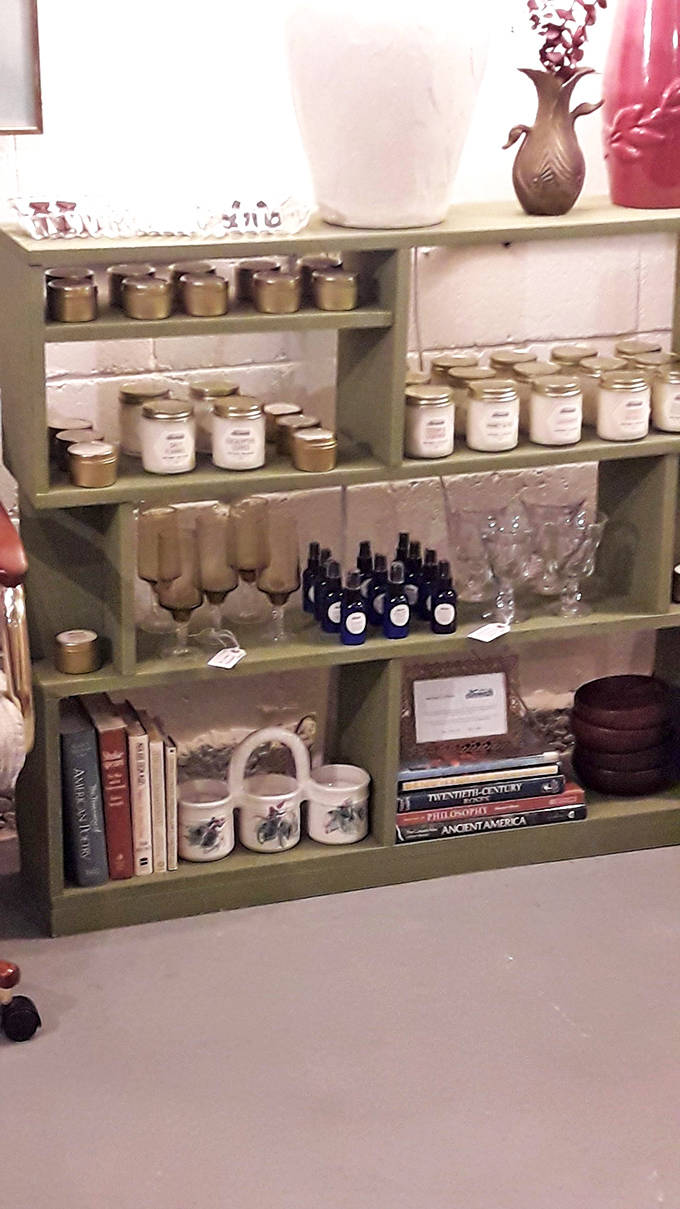 Locally made candles and artisan goods share space with vintage finds, creating a perfect blend of old-school charm and contemporary craftsmanship that supports the community.
