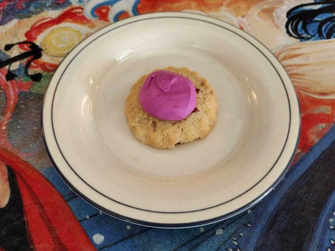 That vibrant thumbprint cookie isn't just Instagram-worthy; it's the perfect balance of buttery shortbread and bright, fruity filling.