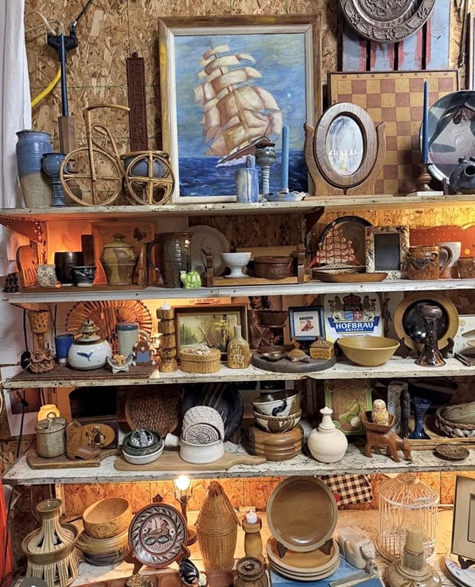 Nautical paintings and vintage finds create vignettes that interior designers would pay good money to replicate.