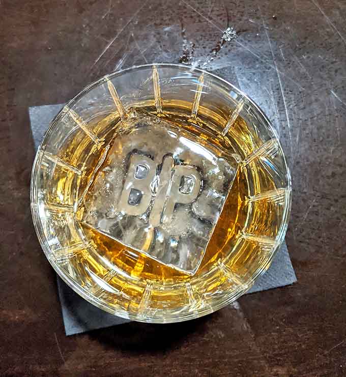 Whisky: Look closely at that custom ice cube &ndash; it's not just keeping your whisky cool, it's a statement that even the smallest details matter here.