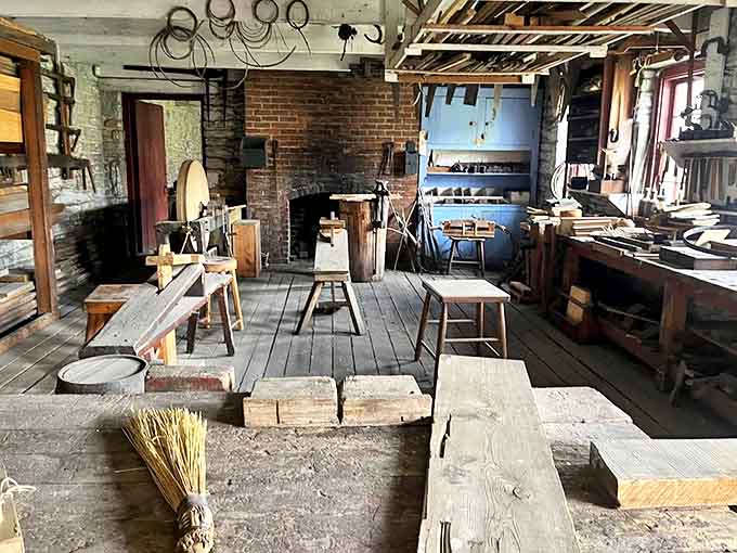 The woodworking shop reveals a world before power tools, where craftsmanship required muscle, patience, and hand-calloused skill.