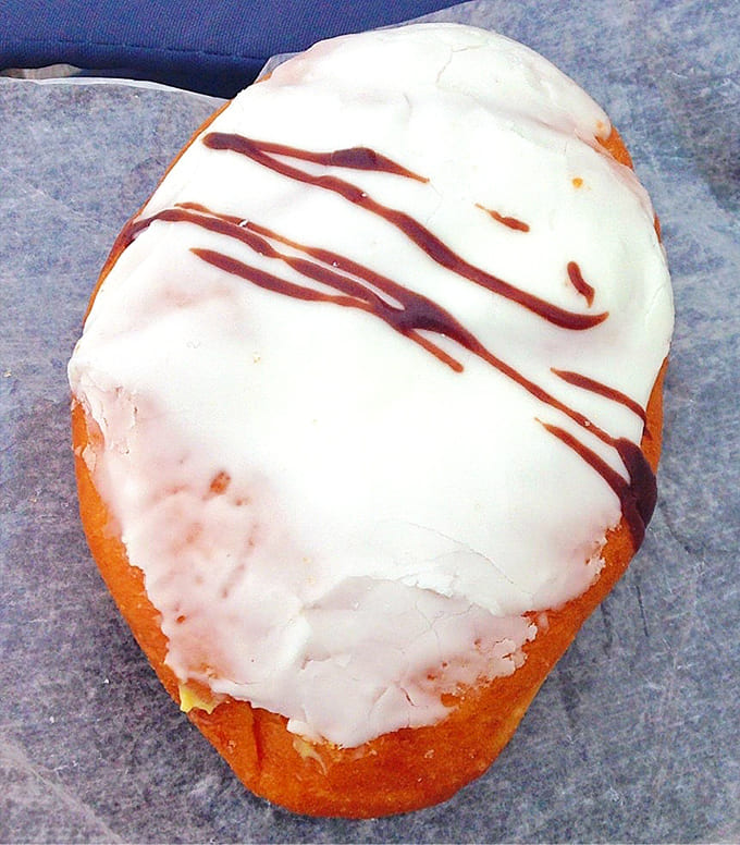 That banana cream filling isn't messing around; this Bismarck means serious business in the best possible way.
