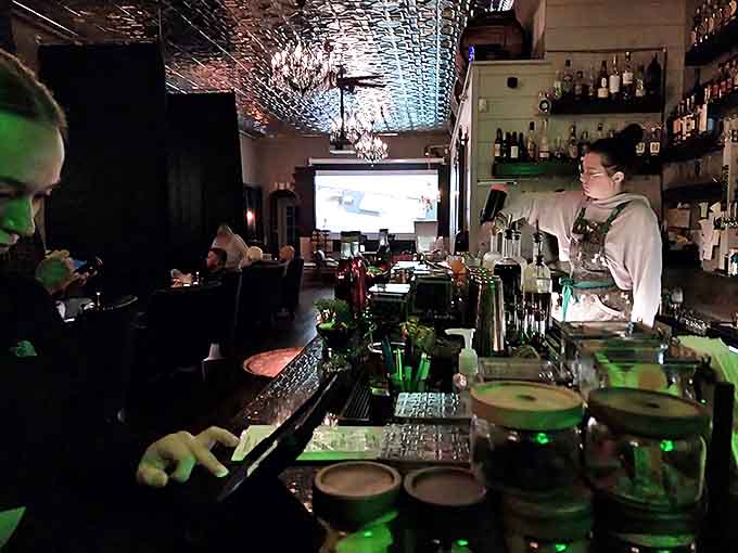 Where mixology meets theater &ndash; Bartenders craft liquid masterpieces with practiced precision, each movement part of a choreographed dance behind the polished bar.