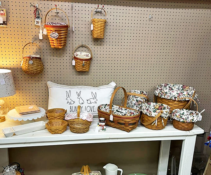 Woven baskets line the pegboard wall like a rustic art installation, offering both storage solutions and farmhouse decor charm in abundance.