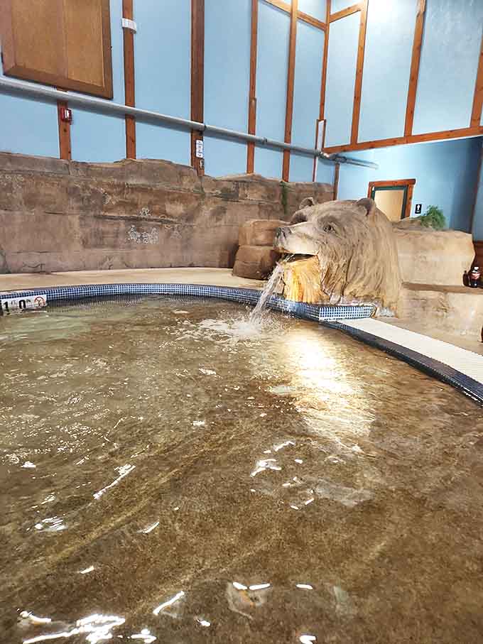 This bear-shaped water fountain perfectly captures the resort's commitment to thematic consistency, even in the smallest details.