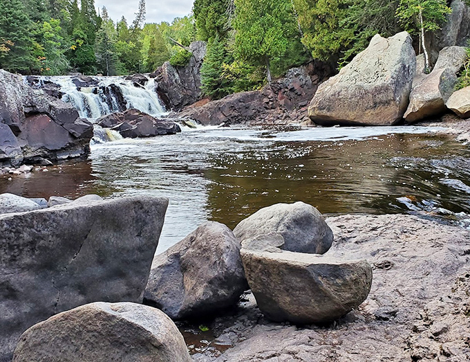 These ancient rocks have witnessed more Minnesota history than the oldest Vikings fan, standing sentinel as countless generations pass by.