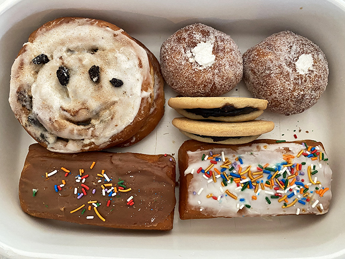Every box tells a story of early-morning bakers crafting treats with care&mdash;smiling rolls, sugar-dusted doughnuts, and sprinkle-topped bars made to brighten your day.