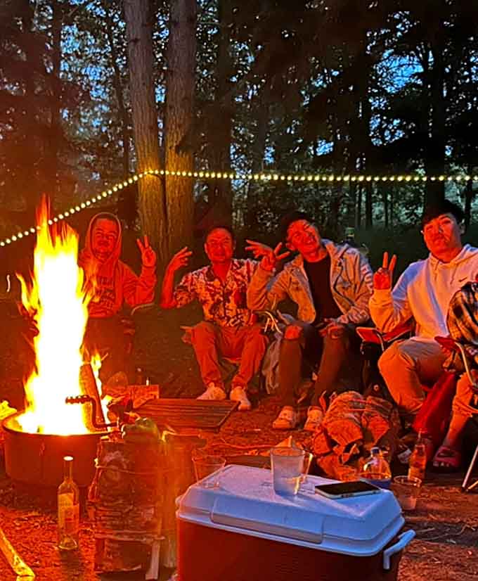 Campfire conversations always seem more profound when accompanied by dancing flames and a chorus of night creatures.