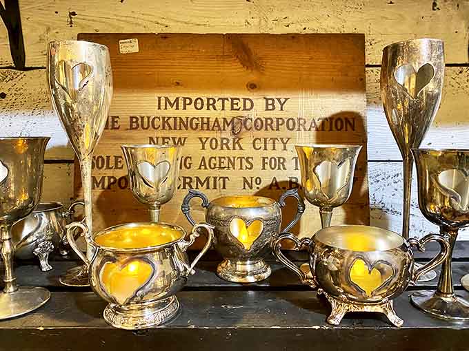 Silver serving pieces with heart-shaped details catch the light, reminding us of an era when Sunday dinner was an event worth celebrating properly.
