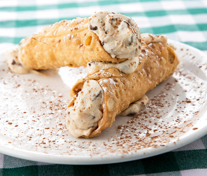 Cannoli that would make your Italian grandmother weep with joy – crisp shells embracing sweet, creamy filling like long-lost lovers.
