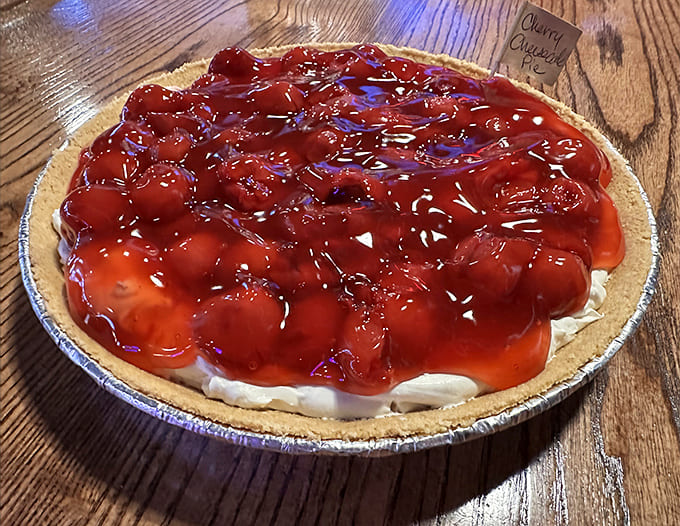 Cherry Cheesecake Pie: A ruby-red layer of cherries glistens atop creamy cheesecake filling &ndash; the perfect balance of sweet, tart and rich.