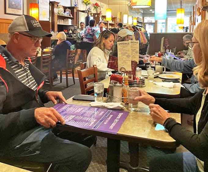 The true heart of any great diner &ndash; regulars and newcomers sharing space, stories, and the universal language of good food.