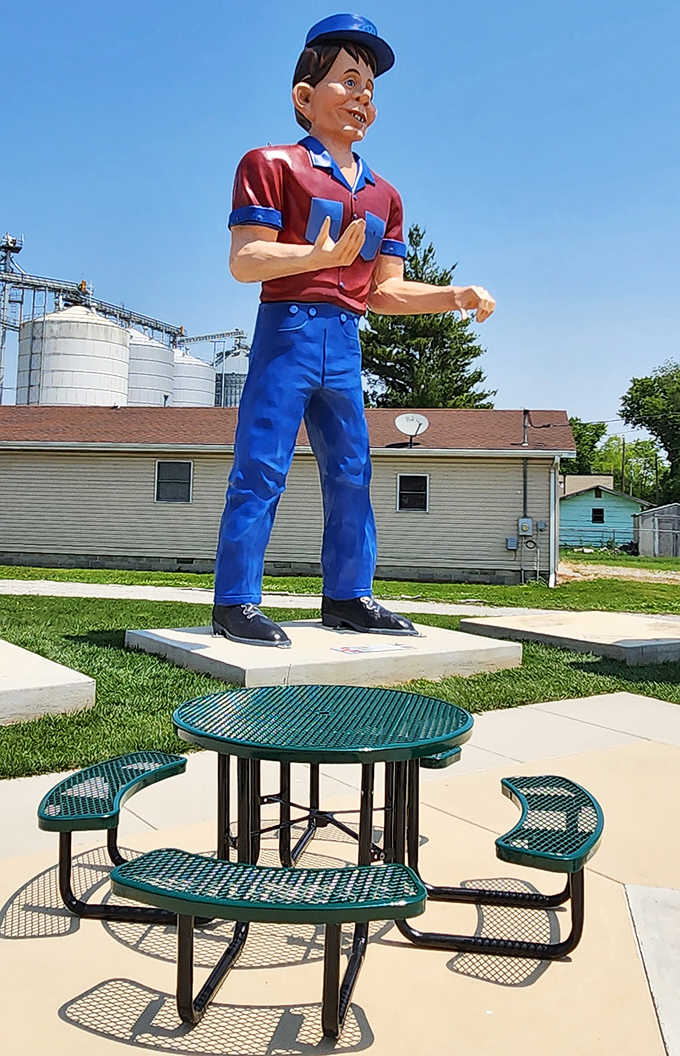 Even the outdoor seating area maintains the roadside theme, with this picnic table dwarfed by the towering figures that surround the museum.