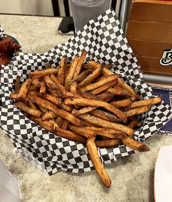 Hand-cut fries that achieve the perfect balance between crispy exterior and fluffy interior - a side dish that refuses to be overshadowed.