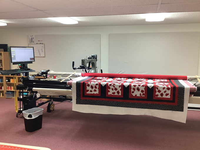 Seasonal displays showcase unexpected fabric combinations, proving Halloween isn't limited to orange and black in the hands of creative quilters.