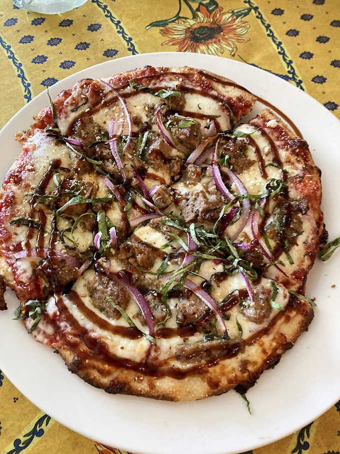 Pizza that benefits from baker's expertise &ndash; a thin, flavorful crust supporting fresh toppings and that game-changing balsamic drizzle.