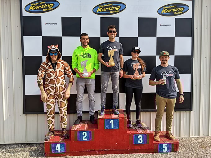 Victory tastes sweet on the podium &ndash; even sweeter when you're wearing a giraffe onesie for reasons only racers understand.