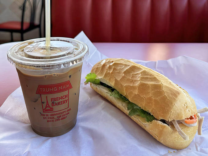 The perfect pairing: a traditional Vietnamese iced coffee alongside a b&aacute;nh m&igrave; that puts ordinary sandwiches to shame.