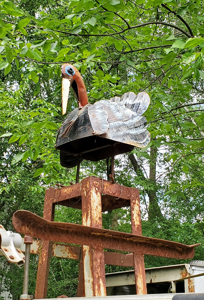 This metal bird sculpture proves that when creativity takes flight, even scrap metal can soar with artistic vision.
