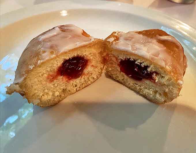 Bite into this innocent-looking pastry and discover why napkins were invented &ndash; the sweet-tart jam center is worth every sticky finger.