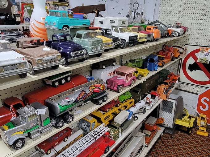 Vintage toy trucks line the shelves, ready to spark nostalgia in collectors who once played with similar models.