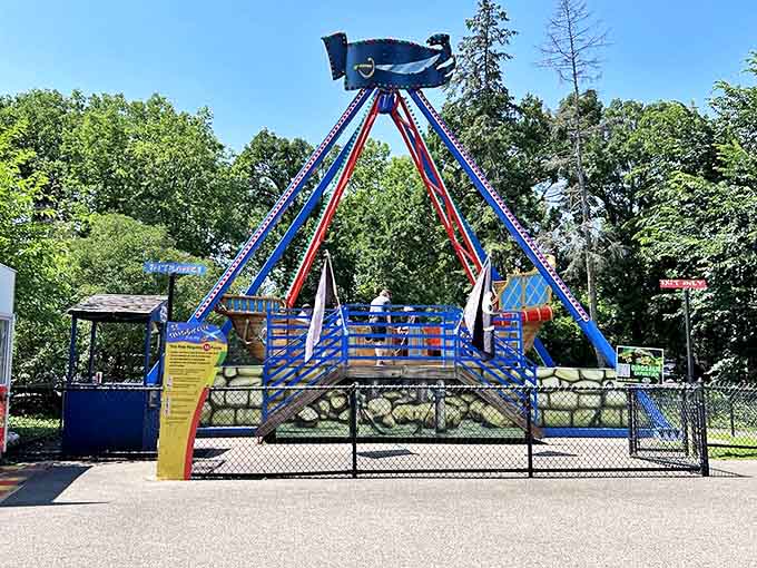 This boat-shaped pendulum ride swings riders back and forth, creating that perfect moment when gravity seems optional and laughter becomes inevitable.