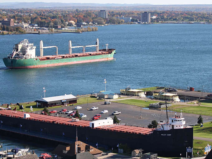 Vital shipping channel: Watch in awe as massive freighters navigate this crucial waterway, demonstrating the delicate dance between raw industrial power and precision.