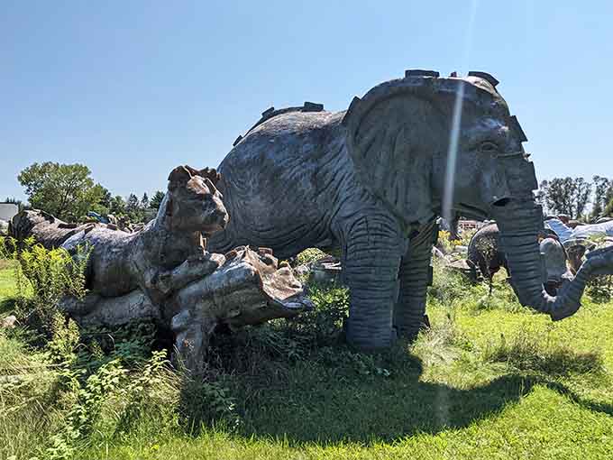 An old caboose sits surrounded by a collection of random objects, creating a strange landscape at this unusual roadside attraction.