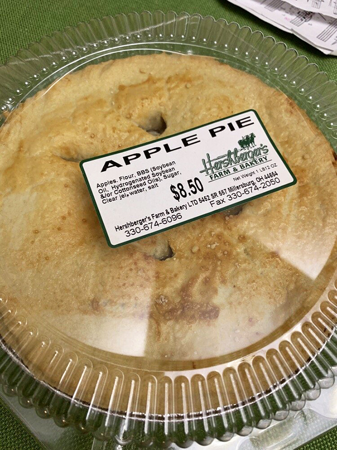 Classic apple pie with a golden crust that would make Norman Rockwell weep, filled with tender fruit and just the right amount of cinnamon sweetness.