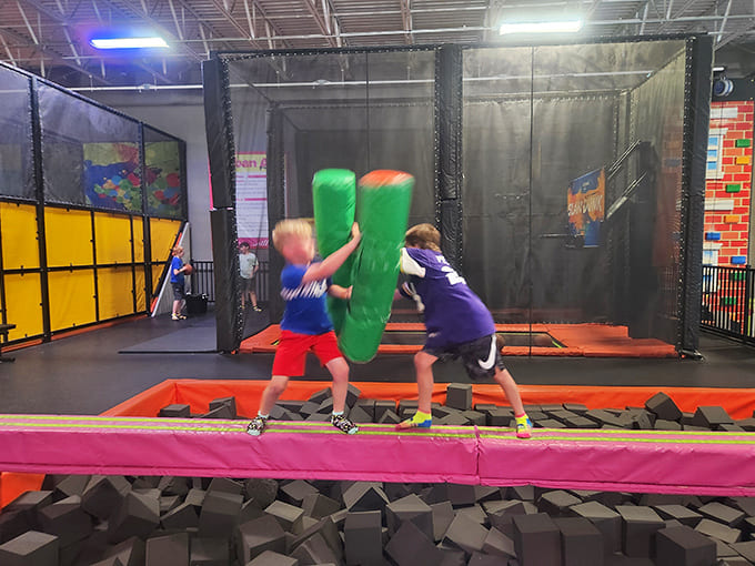 The battle beam arena: where family disputes are settled the old-fashioned way &ndash; with padded jousting sticks and inevitable foam pit falls.