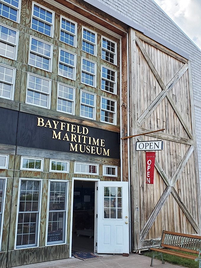 The Maritime Museum's weathered wooden exterior houses treasures from Bayfield's seafaring past, where fishing tales grow taller with each telling.