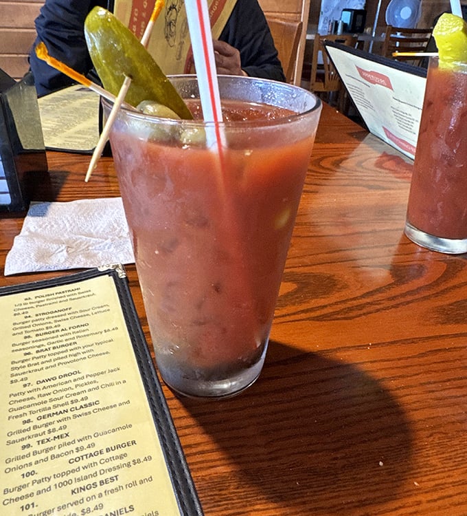 That Bloody Mary isn't just a drink &ndash; it's practically a meal unto itself, complete with the essential pickle spear garnish.