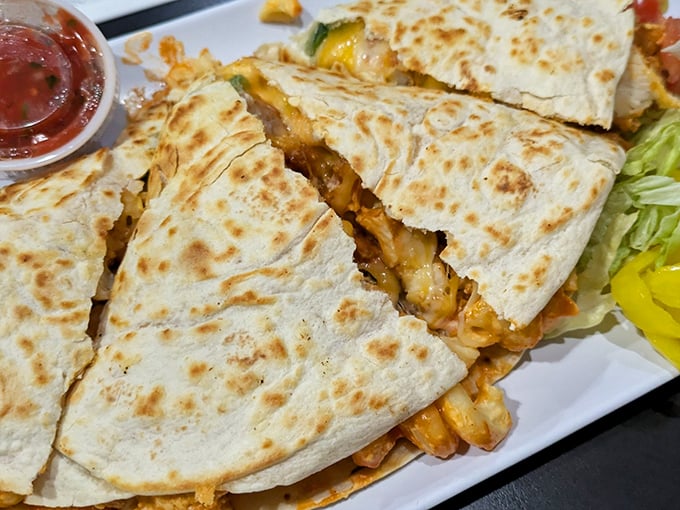 Quesadillas crisp and golden, stuffed with melty cheese and fillings &ndash; simple food done extraordinarily well.