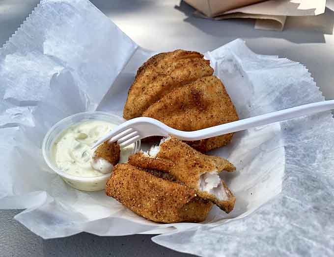 Perfectly fried whitefish pieces with tartar sauce&mdash;a combination so divine it might make you consider relocating to Paradise permanently.